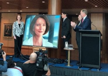Julia Gillard's parliamentary portrait unveiled to stand out in line of men