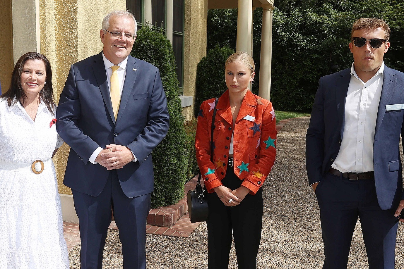 Grace Tame's face says it all in photo with Morrison