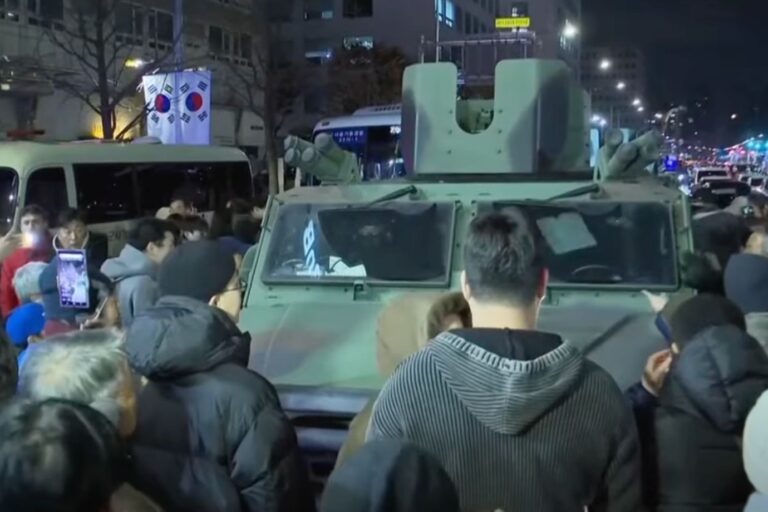 Politician 'crawled between legs of policeman' to enter parliament ...